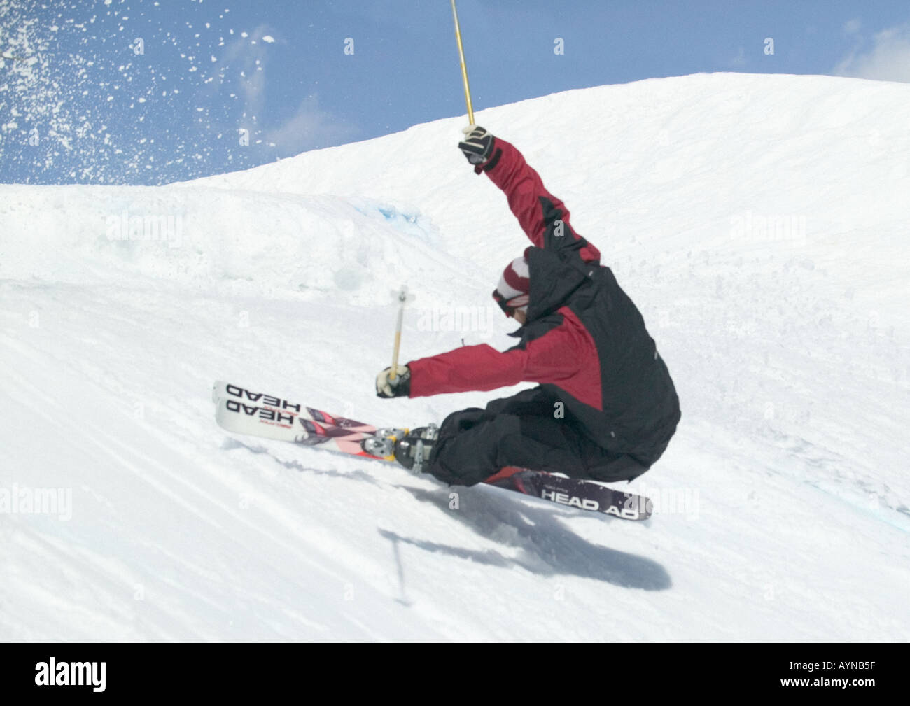 skier falling backwards on slope Stock Photo - Alamy