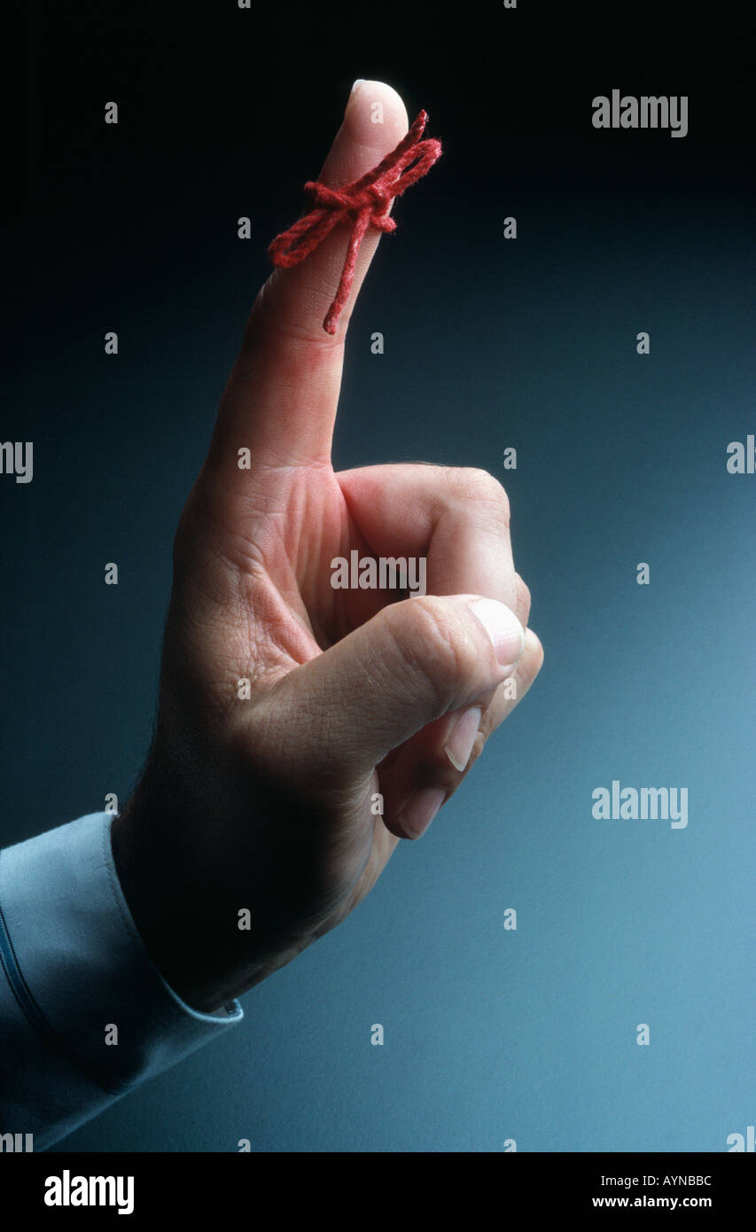 String tied around finger hi-res stock photography and images - Alamy
