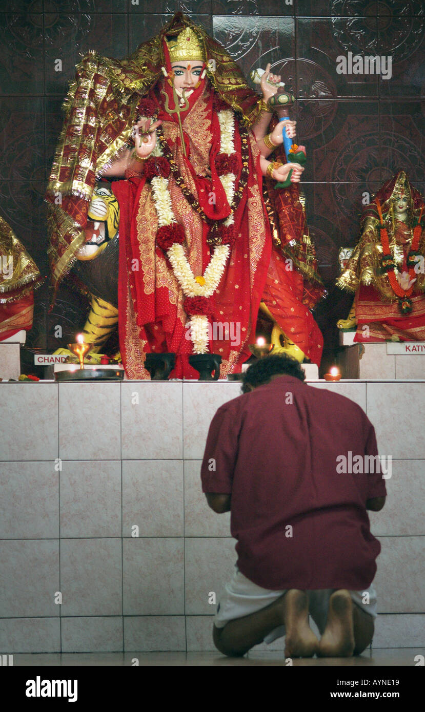 Religious man kneeling praying hi-res stock photography and images - Alamy