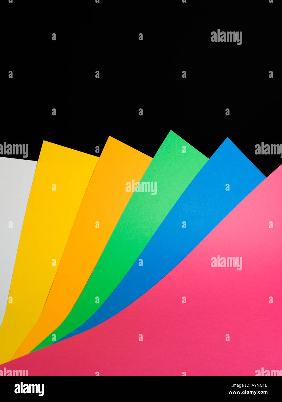 Colorful art paper sheets on a black background Stock Photo - Alamy
