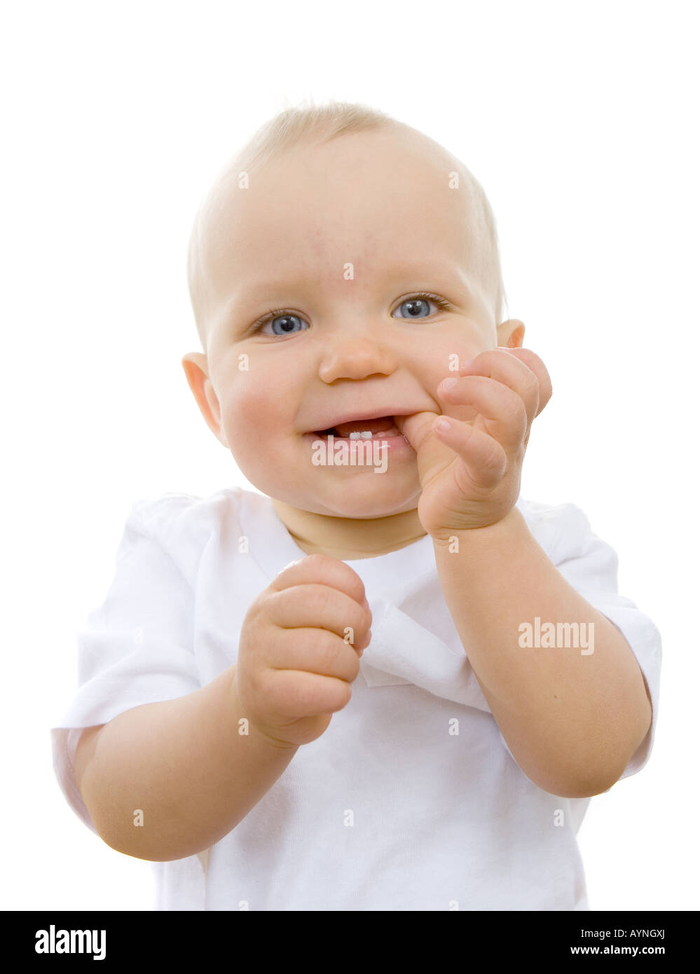 Cute infant with thumb in his mouth and teeth Stock Photo - Alamy