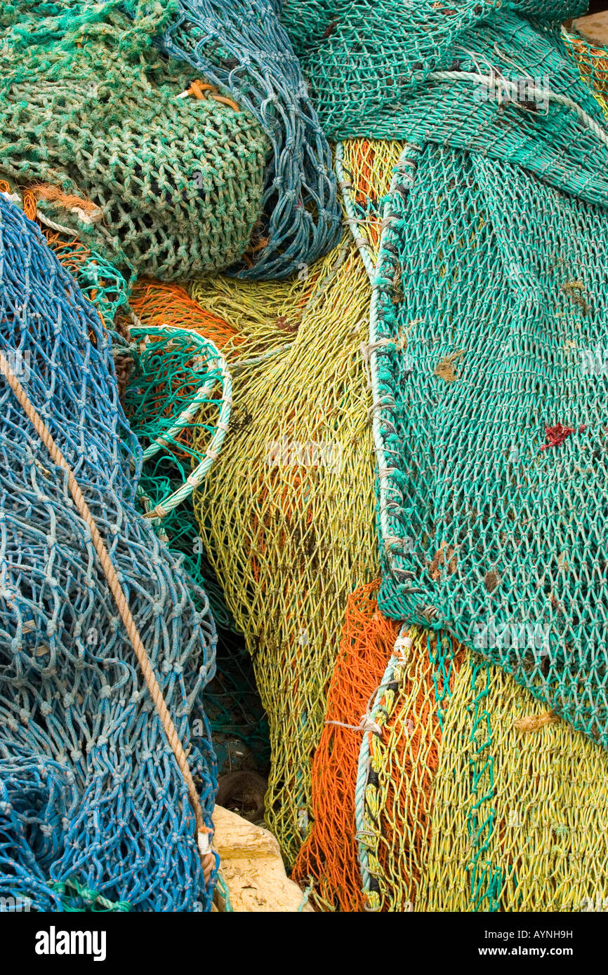 brightly colored fishing nets, Scotland Stock Photo - Alamy