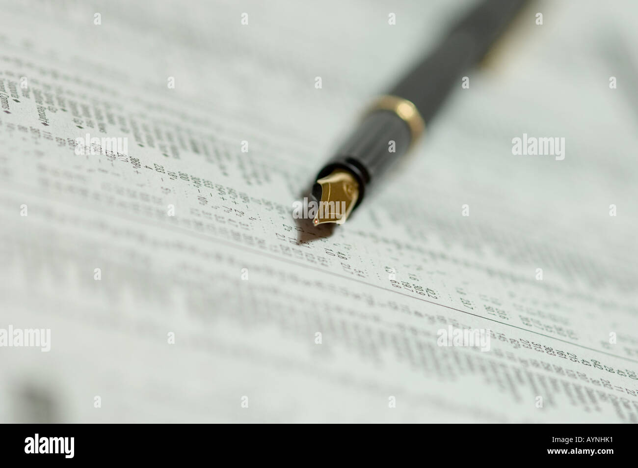 Close up of fountain pen on newspaper business concepts concept Stock ...