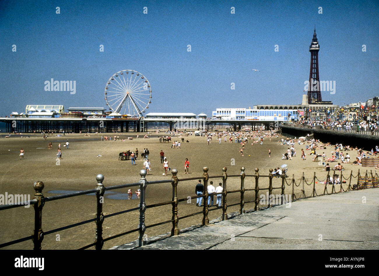 View along the Pleasure Beach from the promenade to Blackpool Tower ...