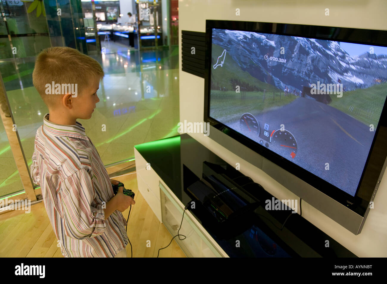Boy playing video game Stock Photo - Alamy