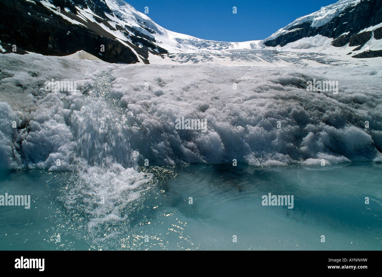 Meltwater flowing from Athabasca Glacier, Banff National Park, Alberta ...