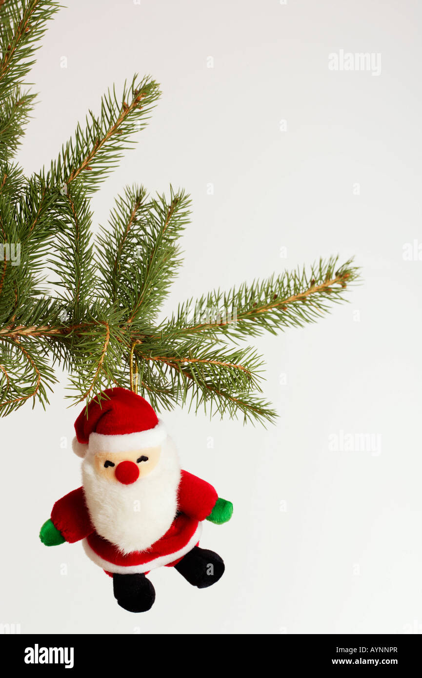 Santa Claus on Christmas tree Stock Photo - Alamy