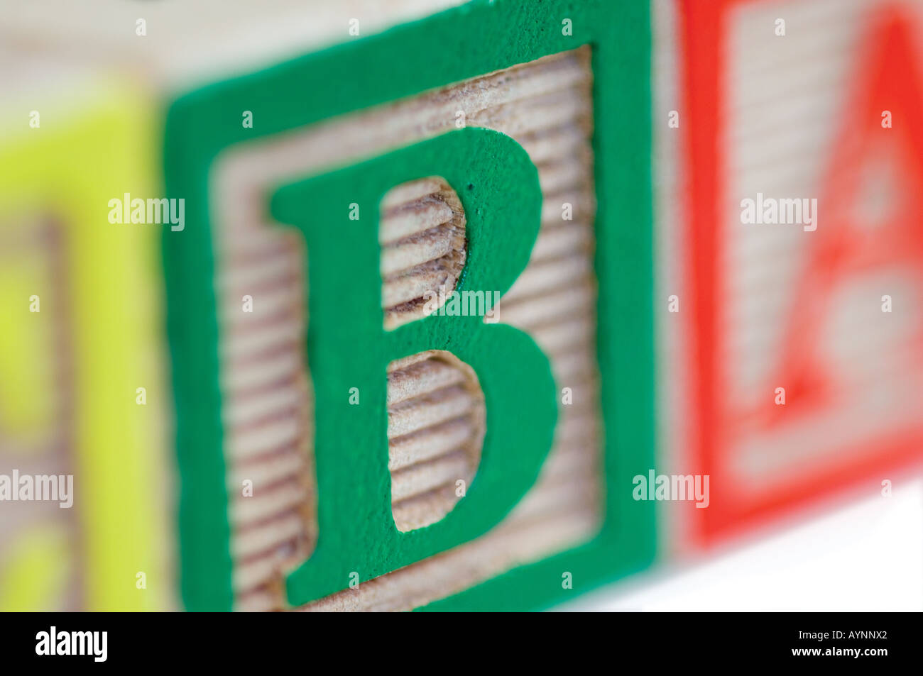 Close up of Coloured wooden toy Bricks brick Stock Photo - Alamy