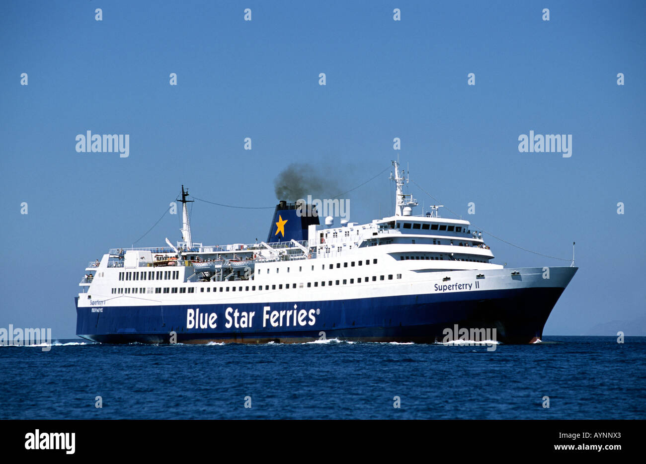 The Superferry 2 of Blue Star Ferries arrives at Tinos in the Greek ...