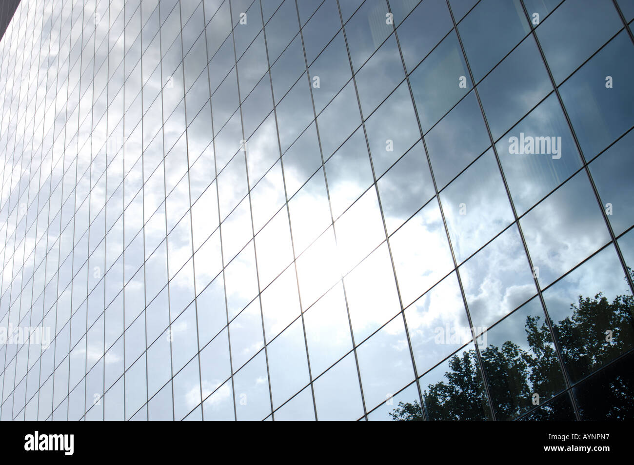Dramatic reflection of sky and clouds in a tower block Stock Photo - Alamy
