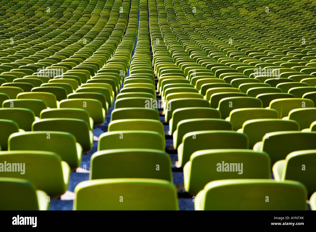 Seats in a row inside an empty stadium Stock Photo - Alamy