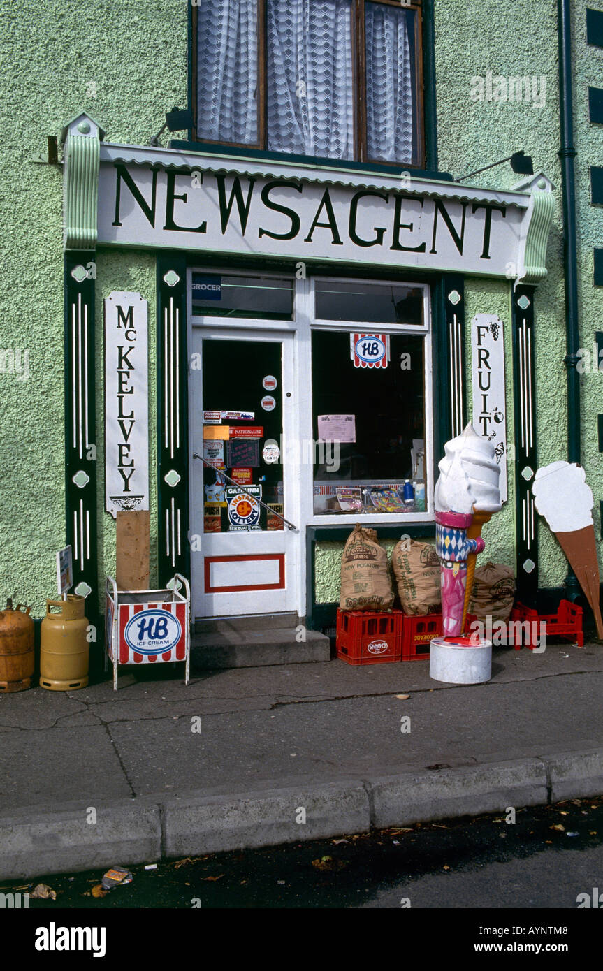 A lime green building houses the newsagent at Portlaoise Stock Photo ...