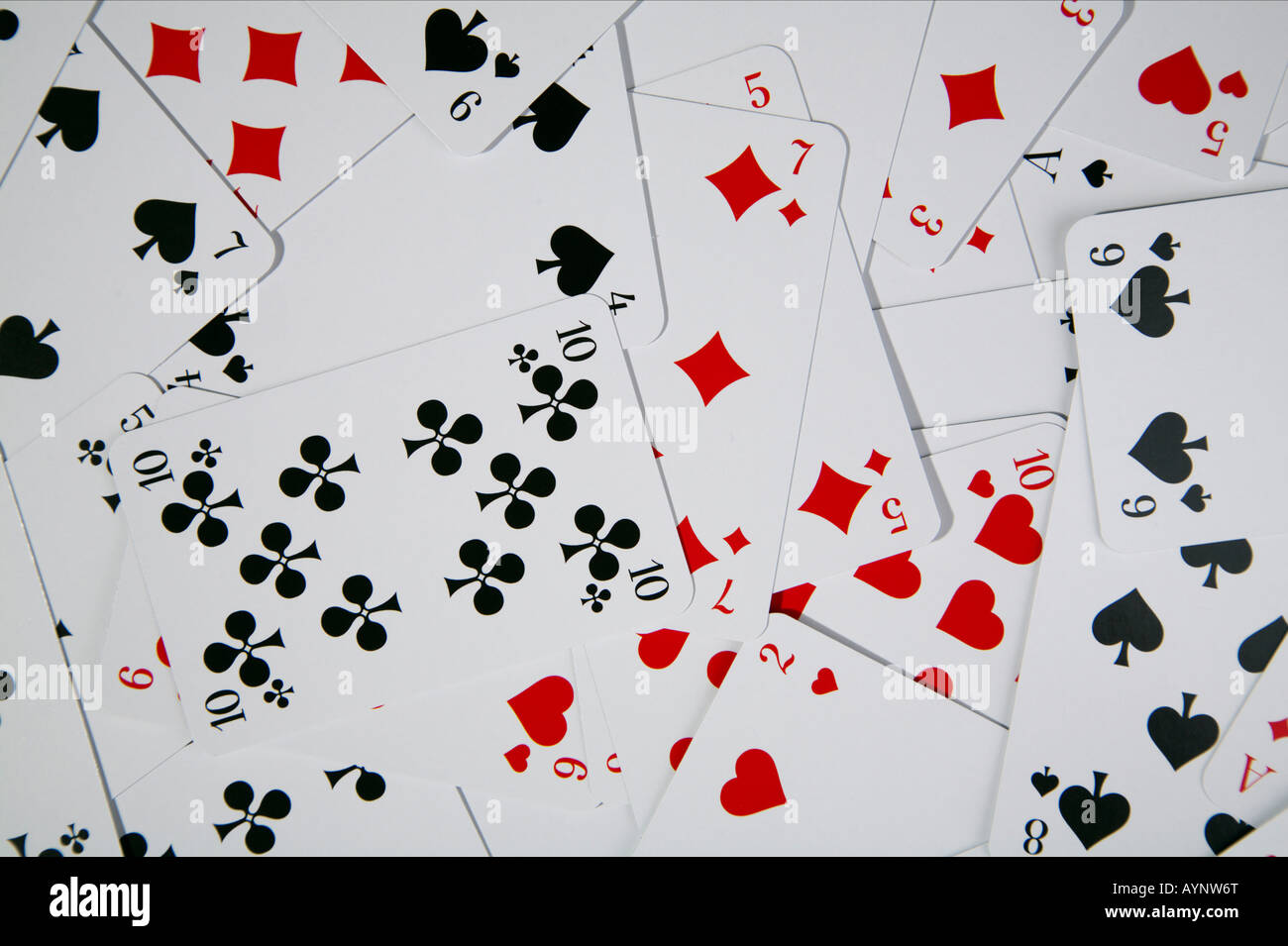 Playing cards mixed together Stock Photo - Alamy