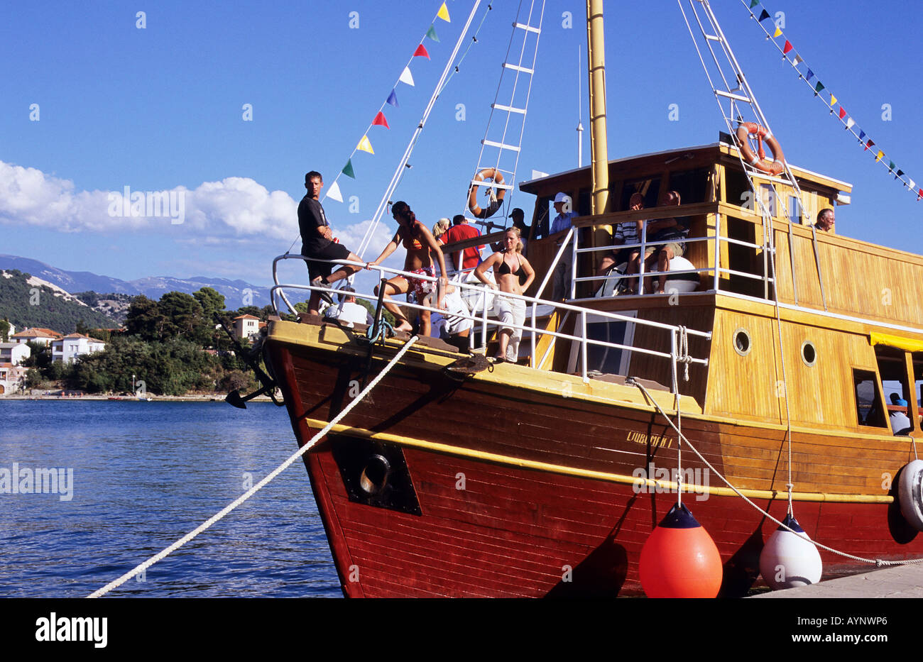 Passengers on board a tour boat Stock Photo - Alamy