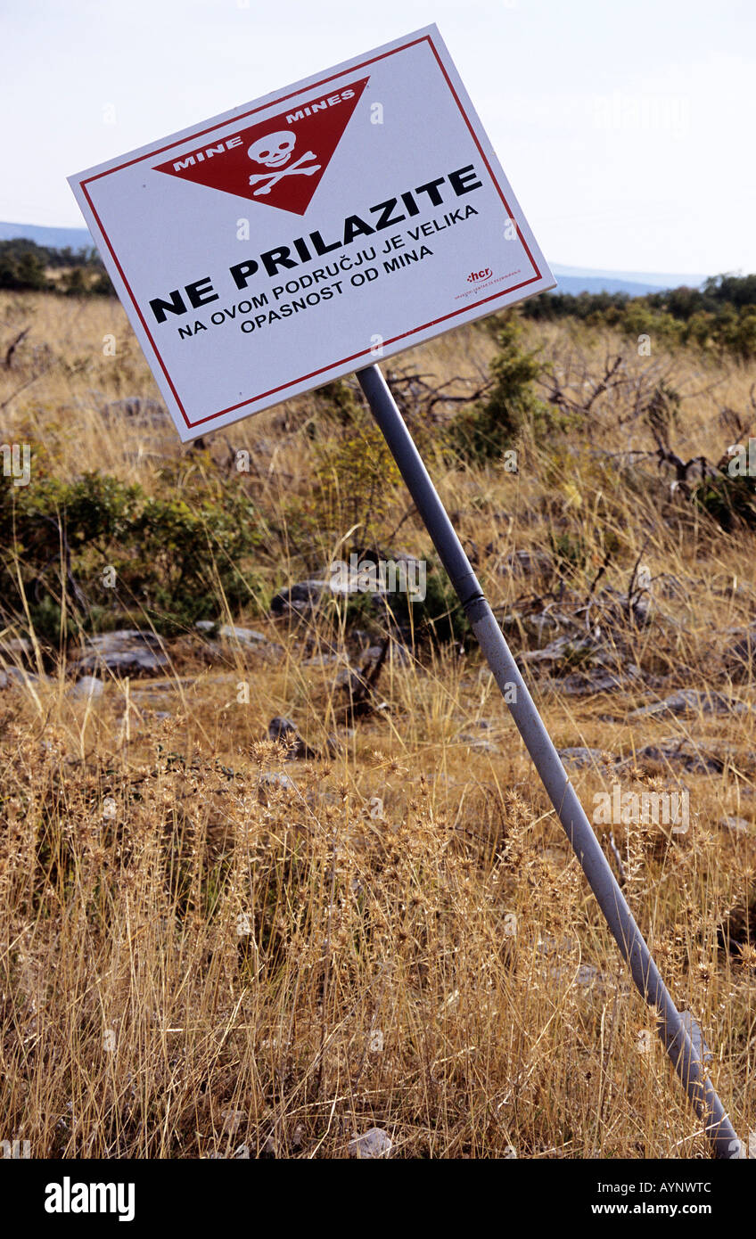 Mine field warning sign Stock Photo - Alamy