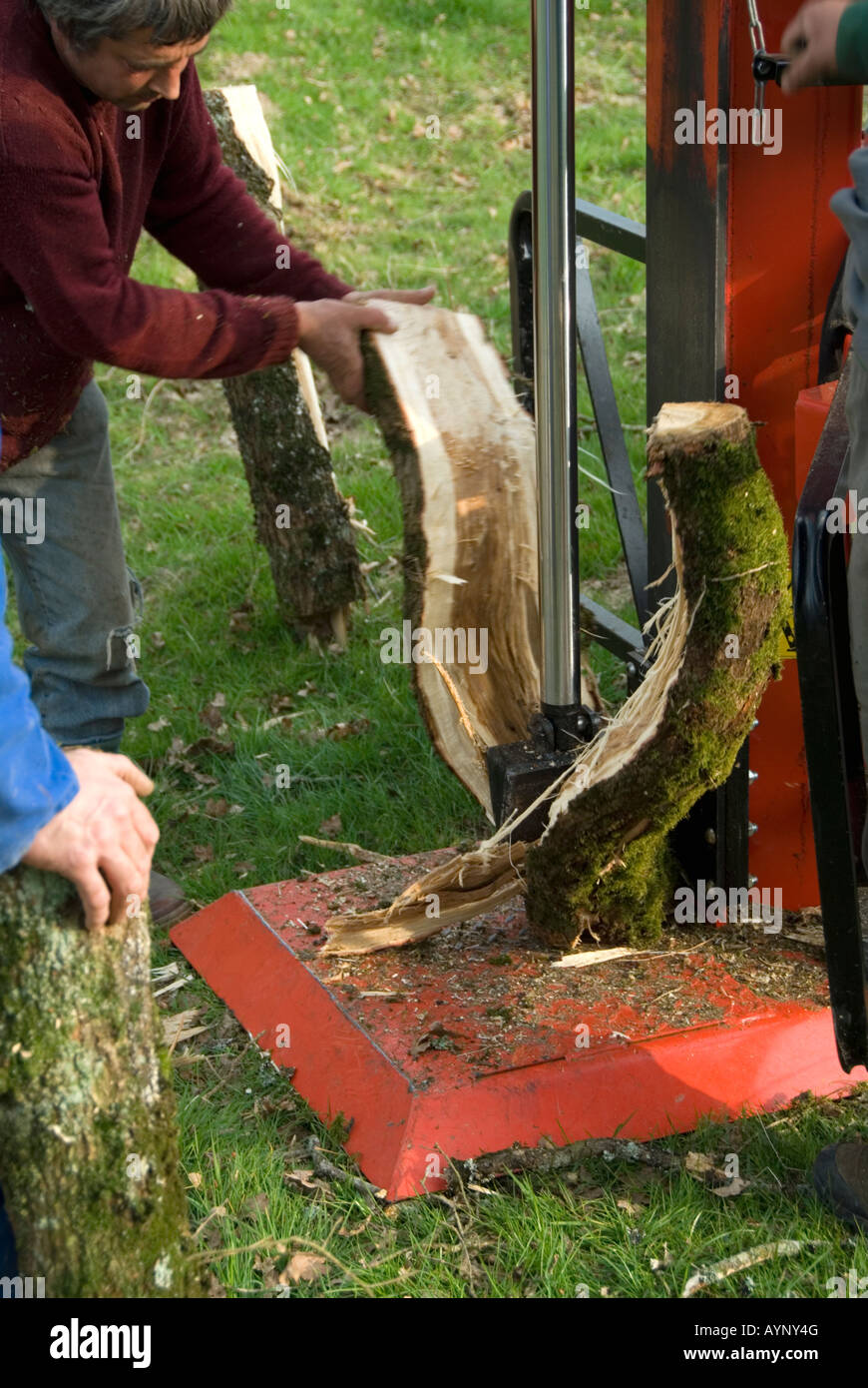 Stock photo of a hydraulic log splitting machine attached to a tractor ...