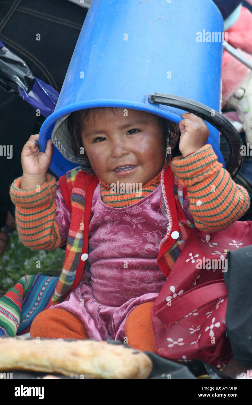 Child bucket on head hi-res stock photography and images - Alamy
