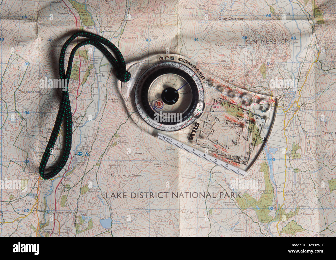 Compass sat on an Ordnance Survey map of the Lake District National ...