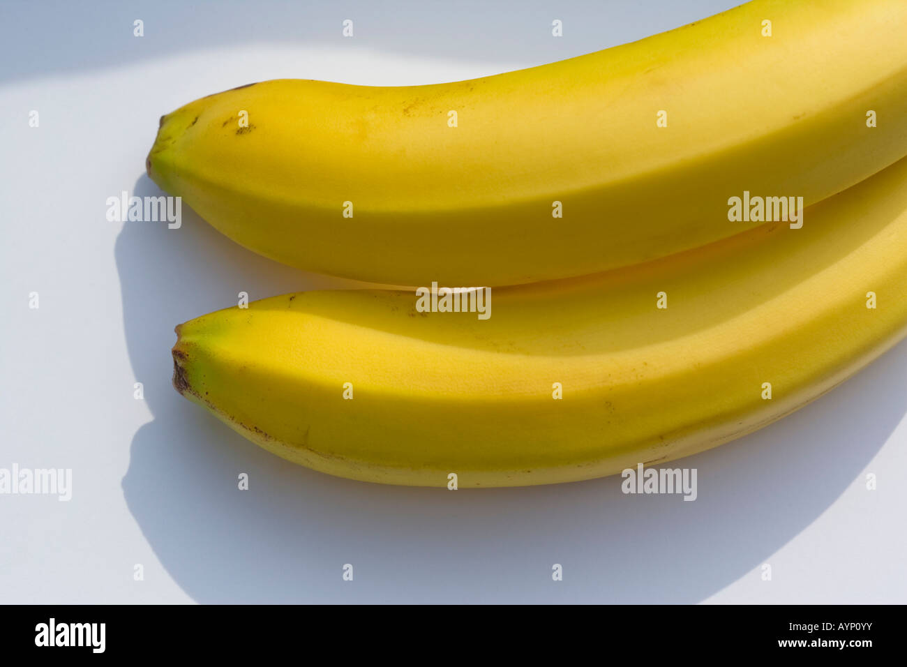 Two bananas on plate hi-res stock photography and images - Alamy
