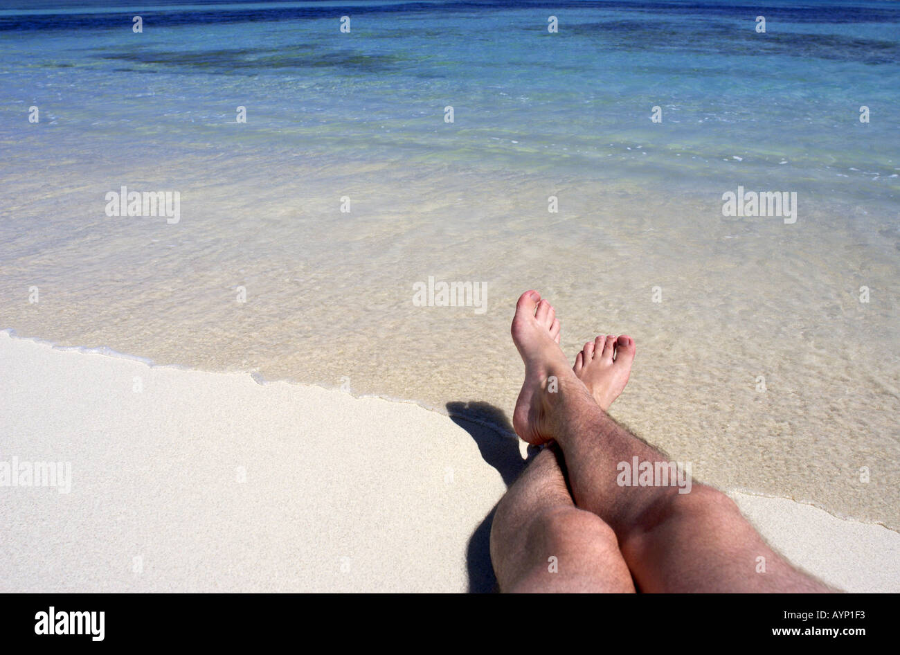 Man feet at indian ocean hi-res stock photography and images - Alamy