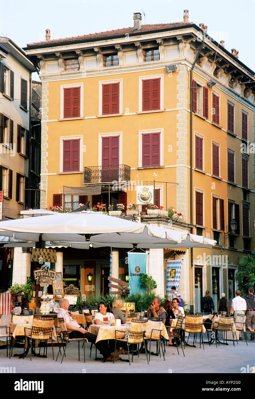 People having drinks at a cafe Piazza della Vittoria Salo west side of ...