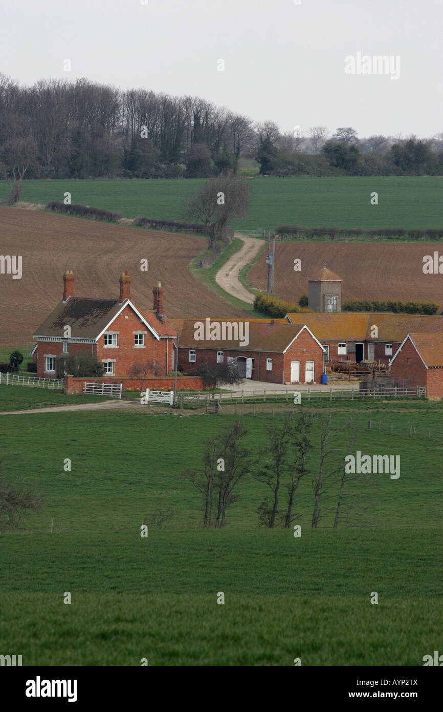 Farmhouse Buildings In Rolling Countryside Stock Photo - Alamy