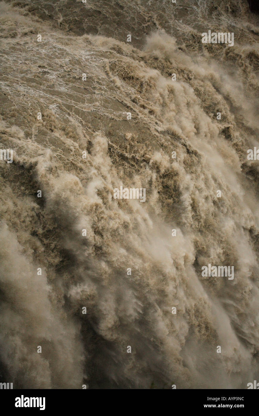 A massive waterfall surges during flooding Stock Photo - Alamy