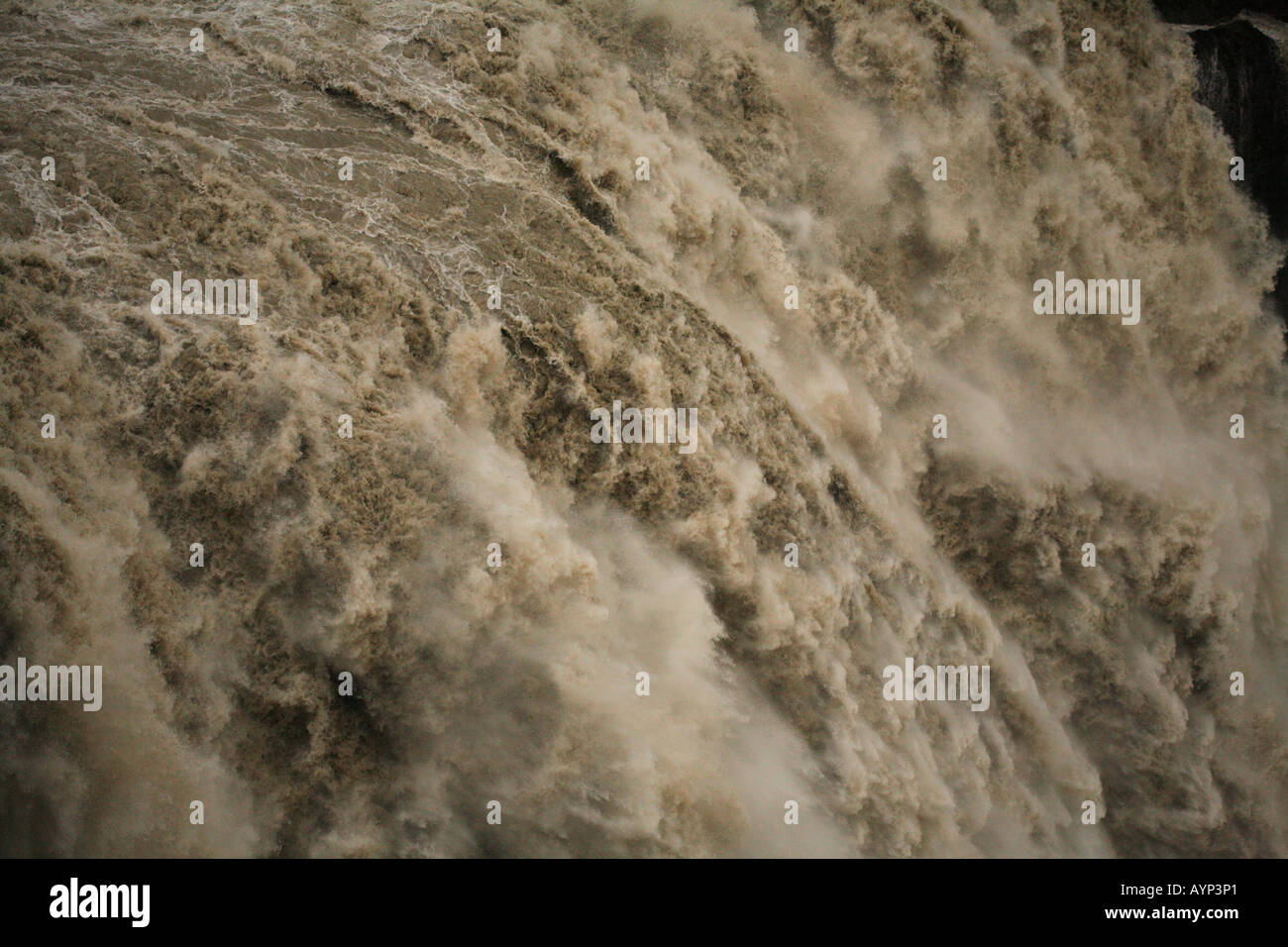 A massive waterfall surges during flooding Stock Photo - Alamy