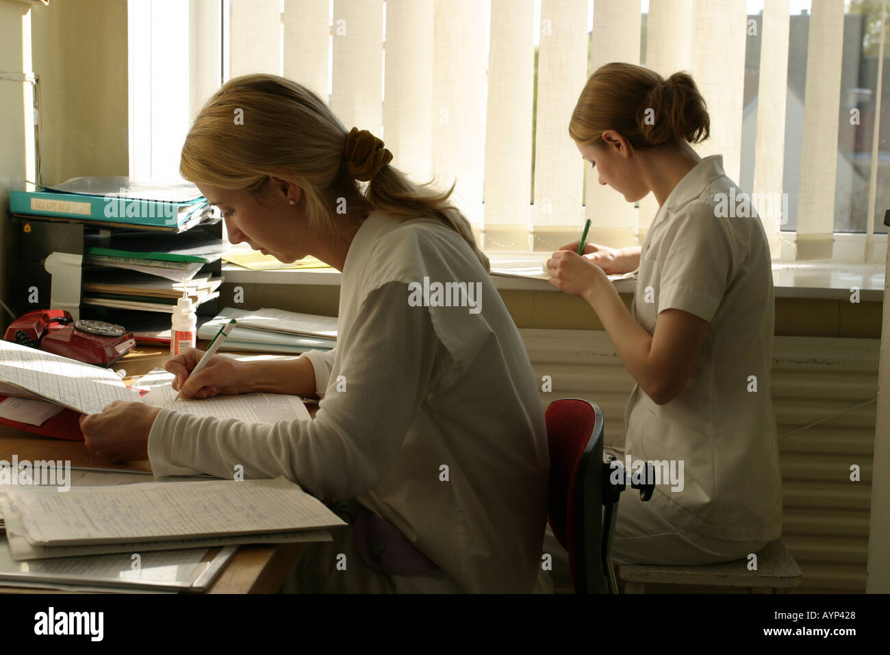 hospital staff working on medical records Stock Photo - Alamy