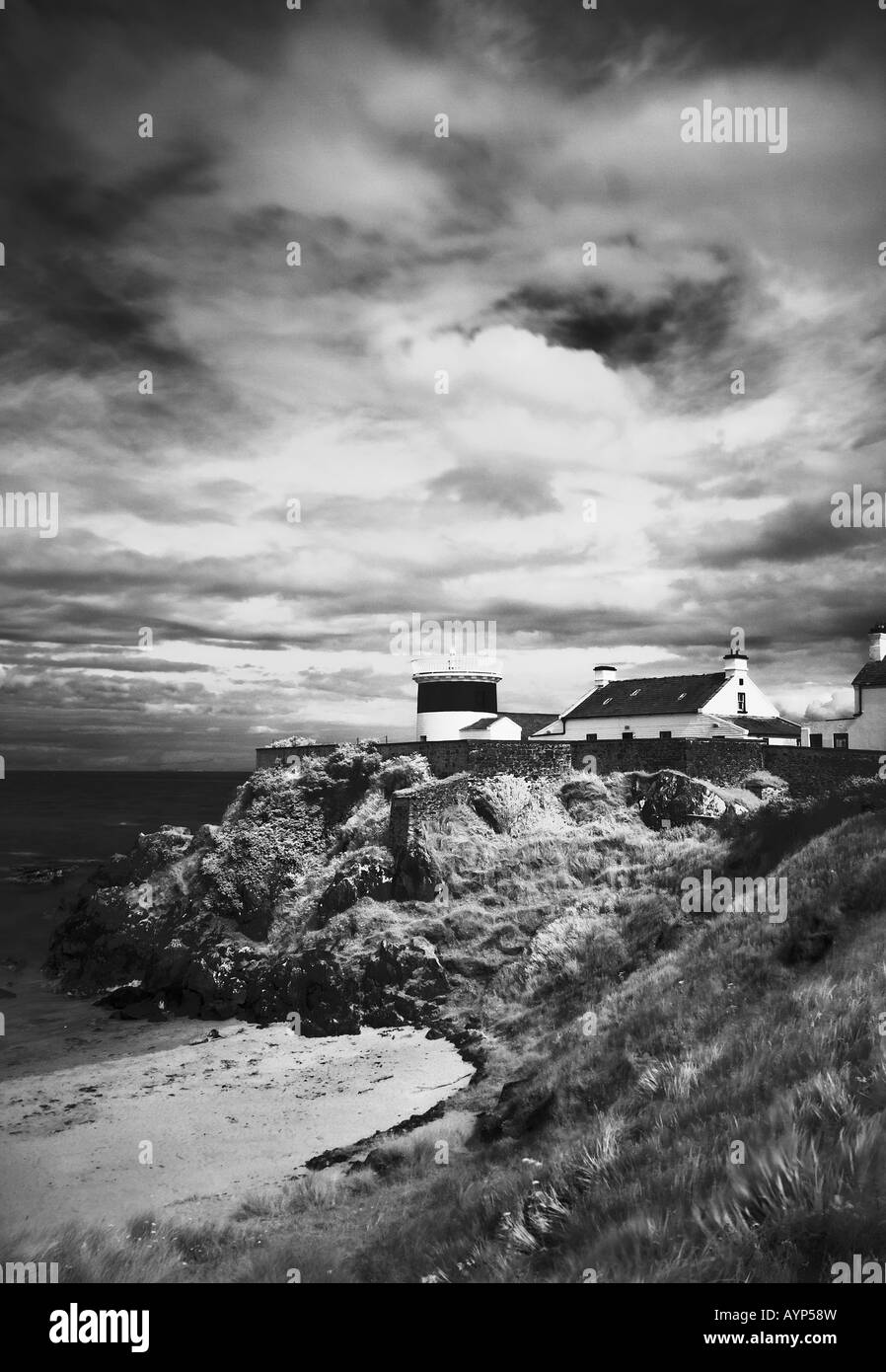 Lighthouse coast windy windy Black and White Stock Photos & Images - Alamy