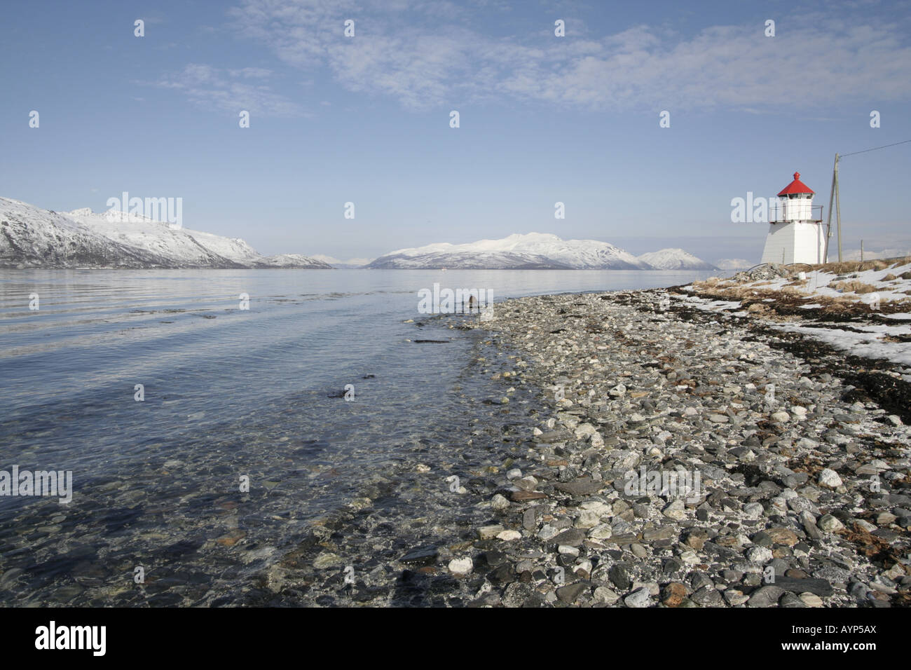 tromso beach spring thaw norway coast lighthouse Stock Photo - Alamy