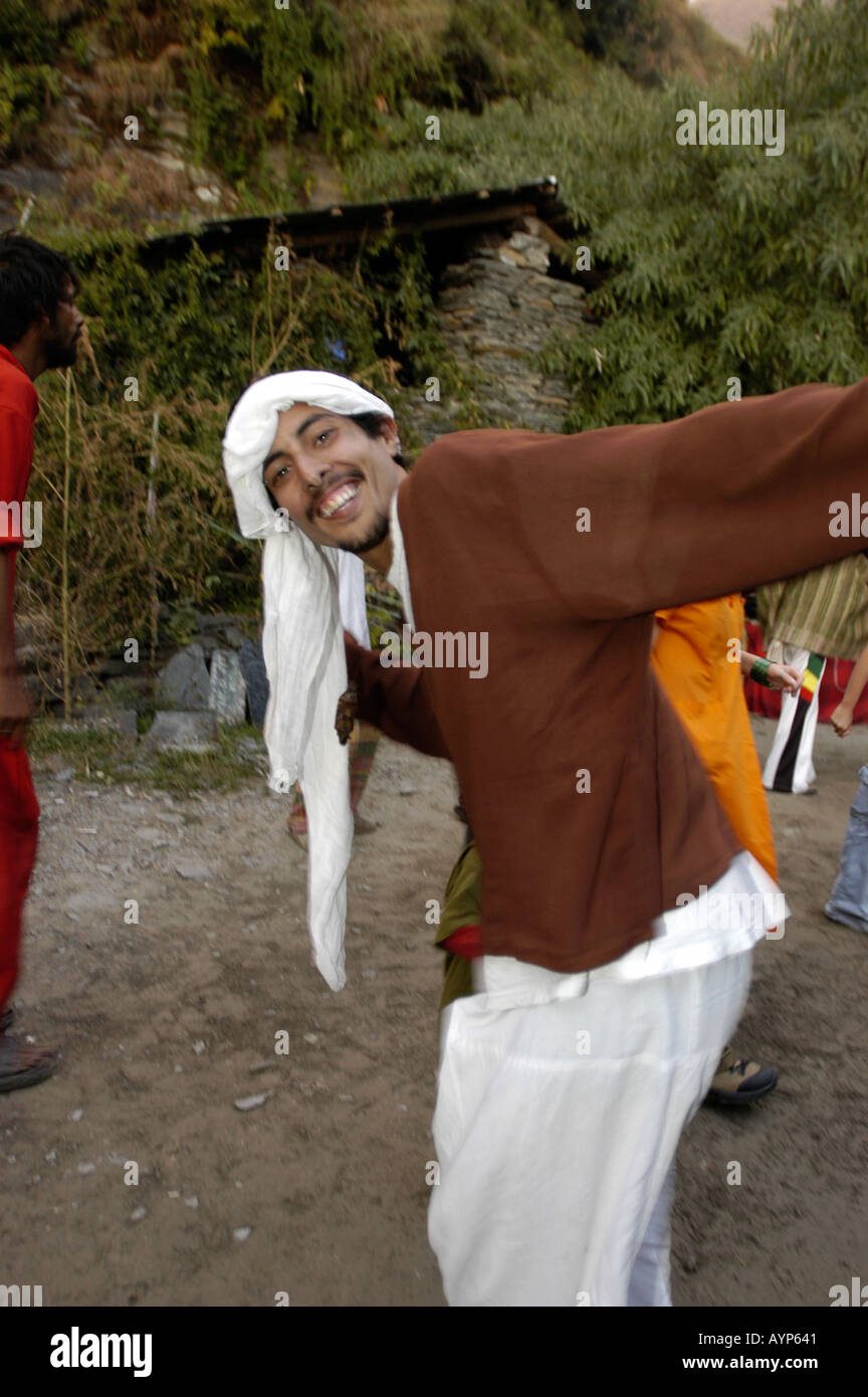 Indian man dancing and looking at camera trance party in Shiva Cafe ...