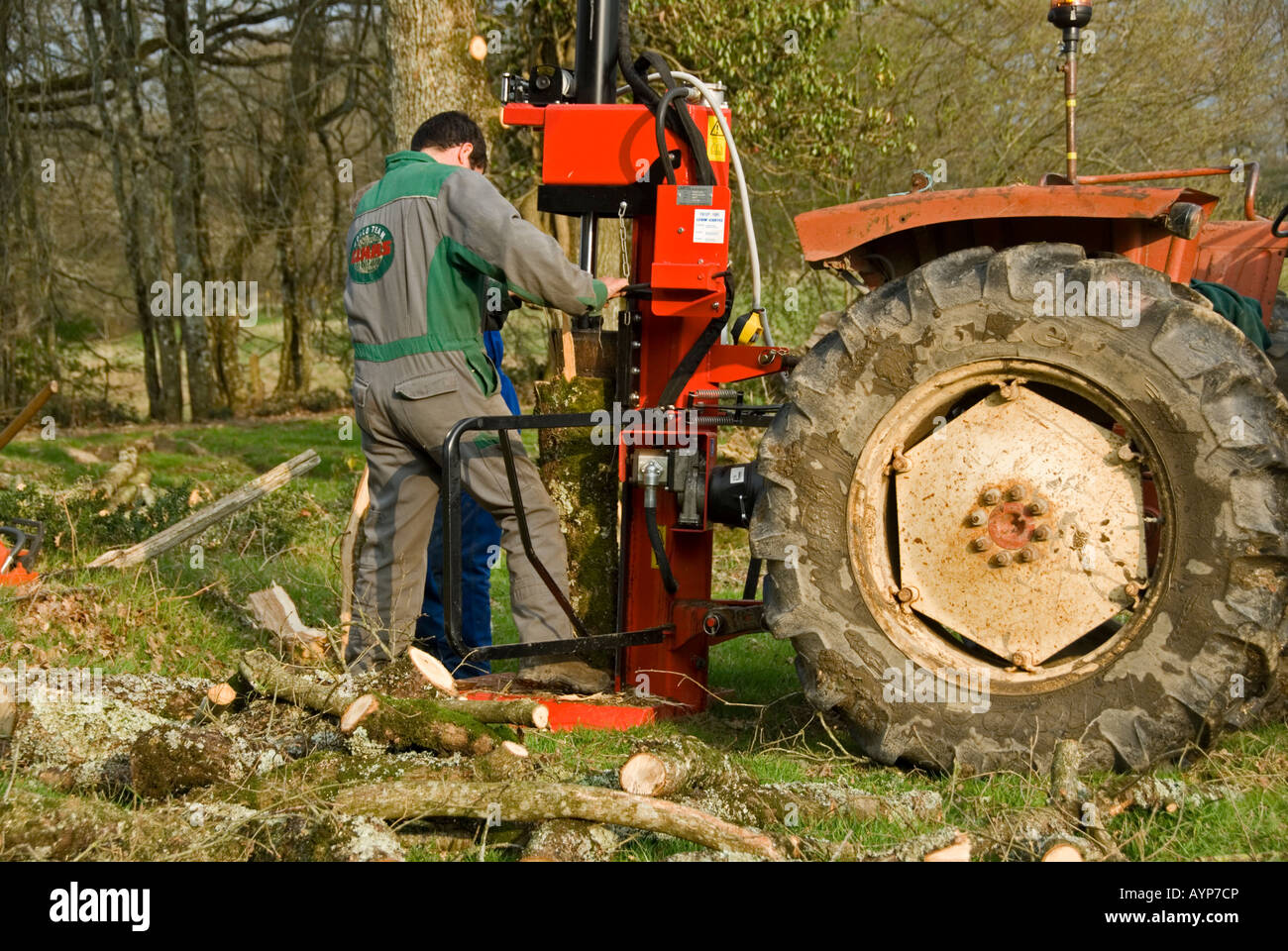 Stock photo of a hydraulic log splitting machine attached to a tractor ...
