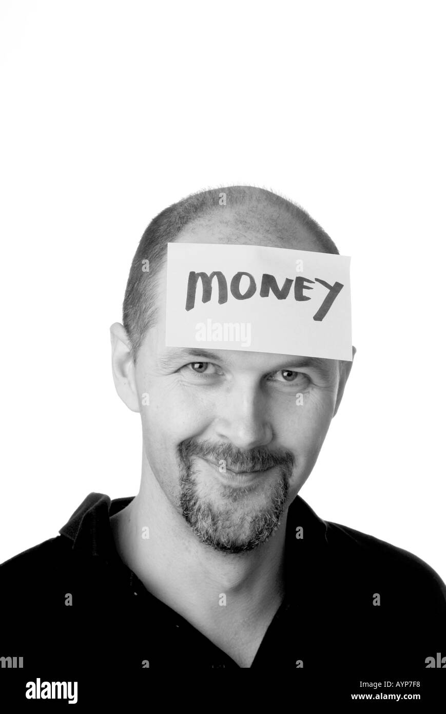 Man with post it note on head illustrating that he is thinking about ...