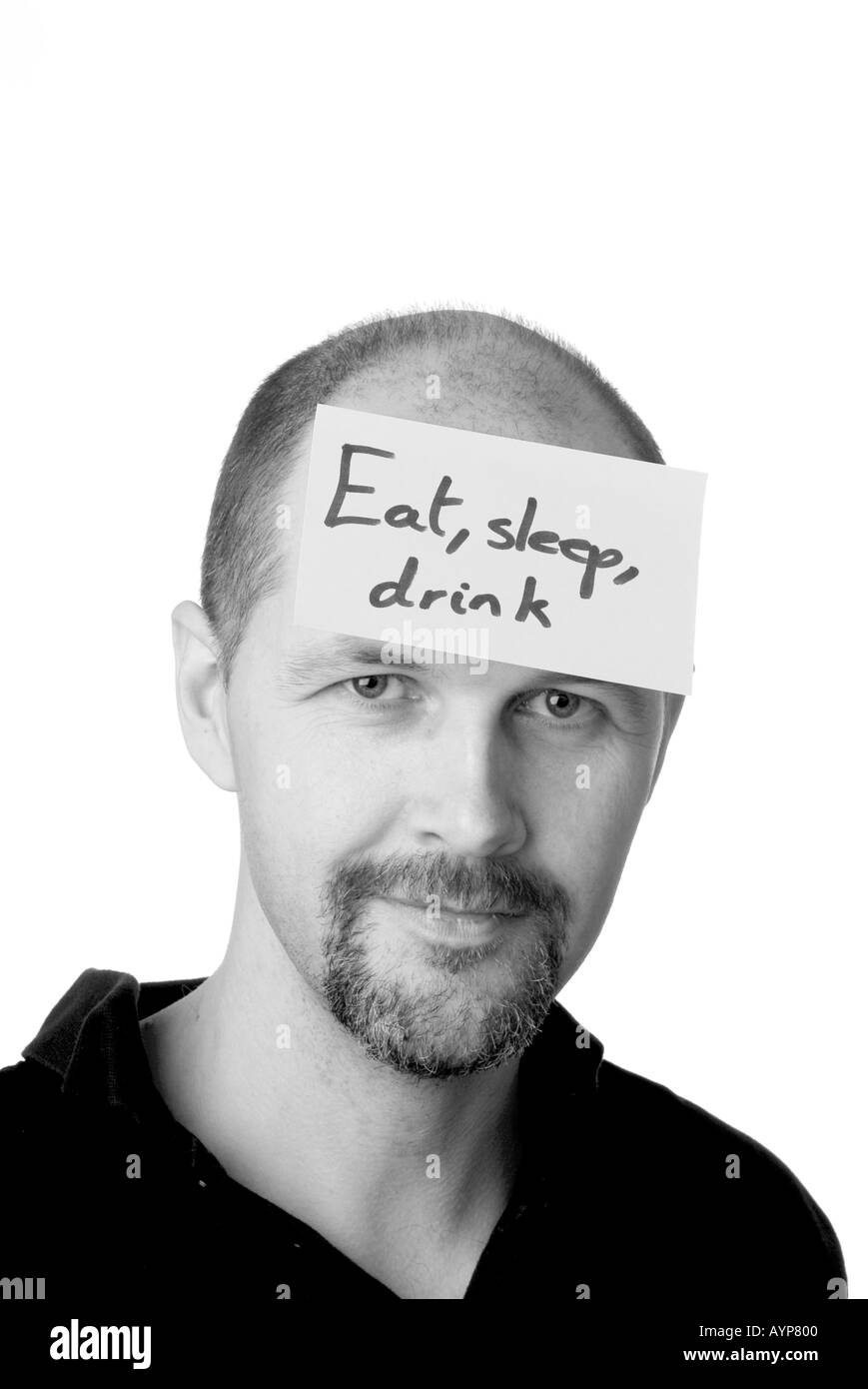 man with a post it note on his head representing that he is thinking ...