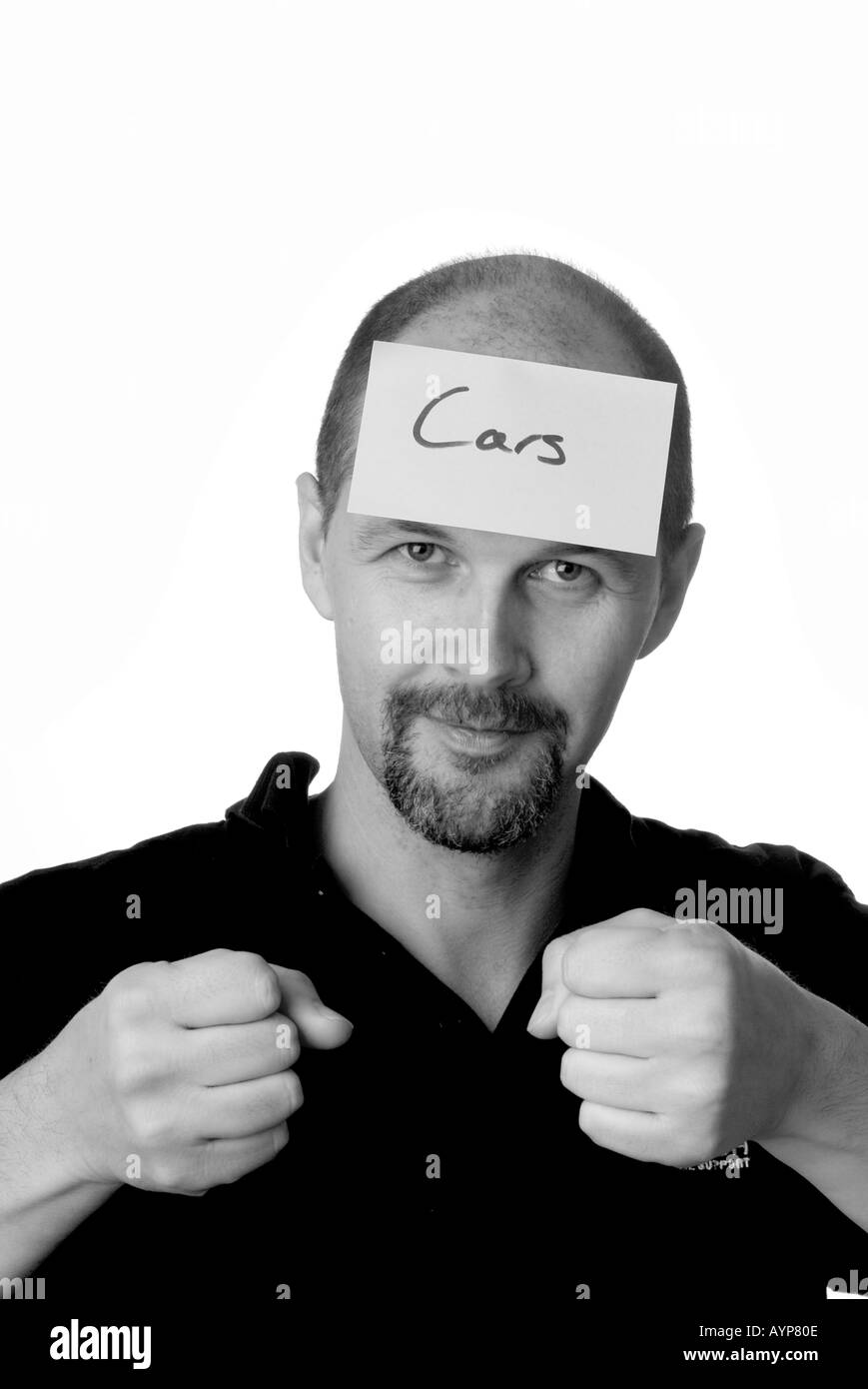 Man with post it note on head illustrating that he is thinking about ...