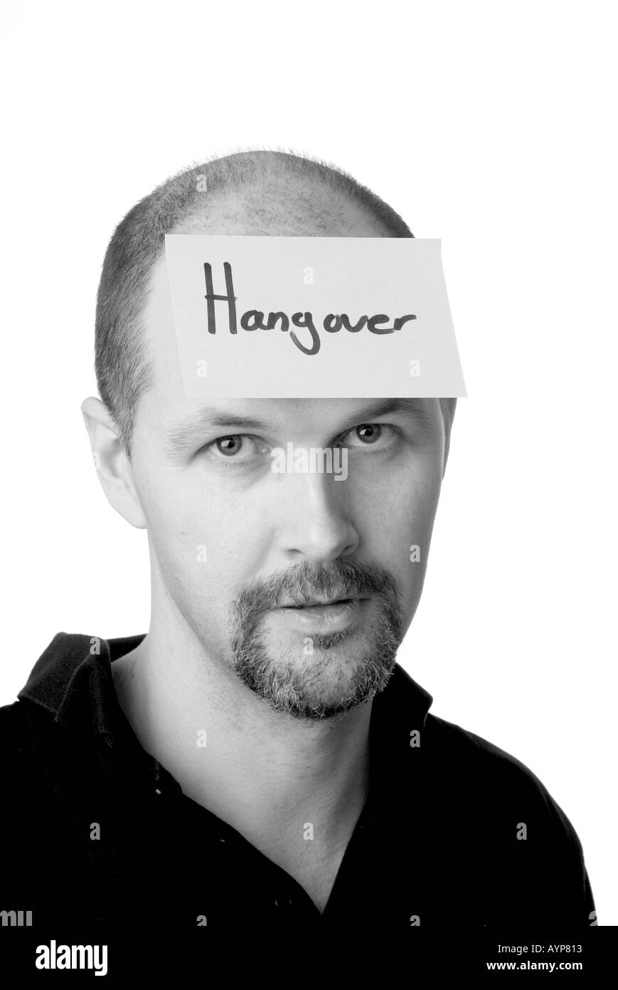 man with post it note on head illustrating head ache headache beer ...