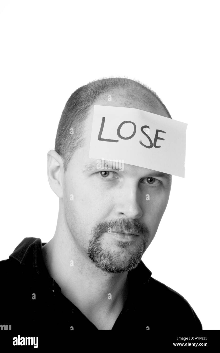 man with a post it note on his head representing that he is not a ...