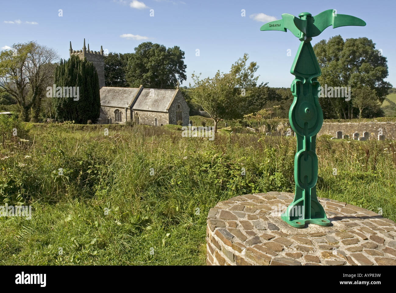 Church of St Thomas a Becket at Sourton and Granite Way signpost on the northwestern edge of ...