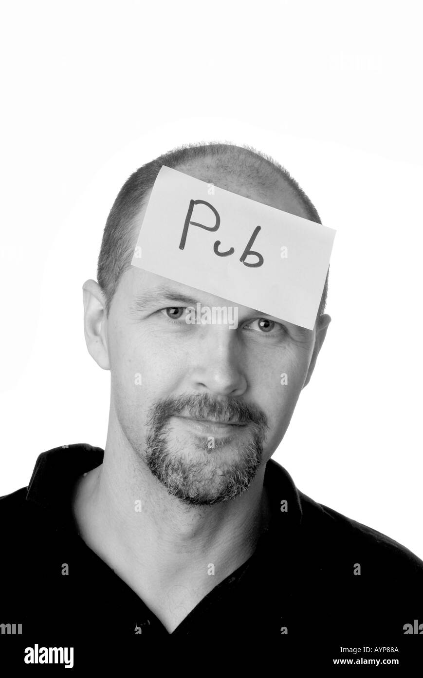 man with post it note on his head thinking about going to the pub drink ...