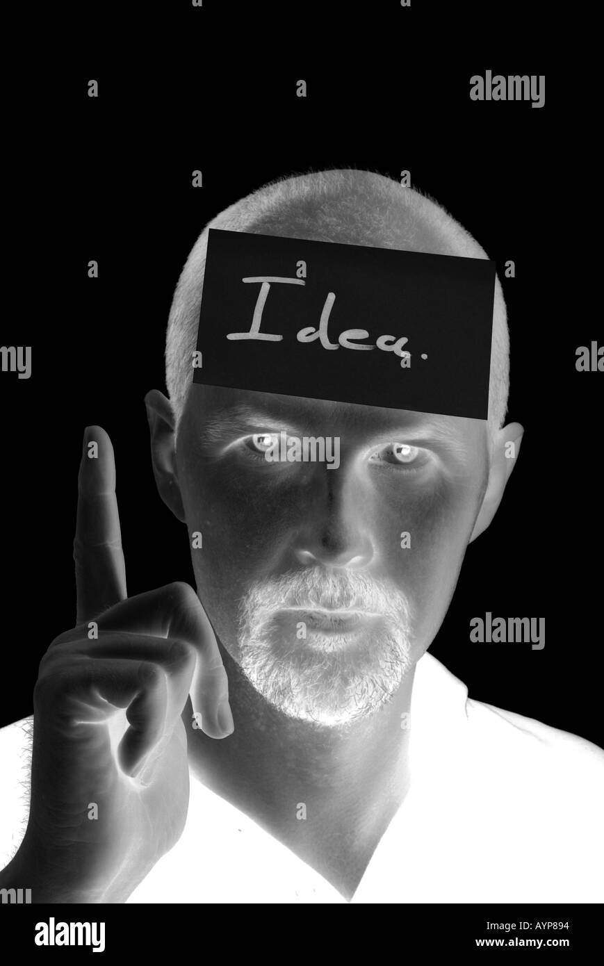 Man with post it note on head illustrating that he is having an idea ...