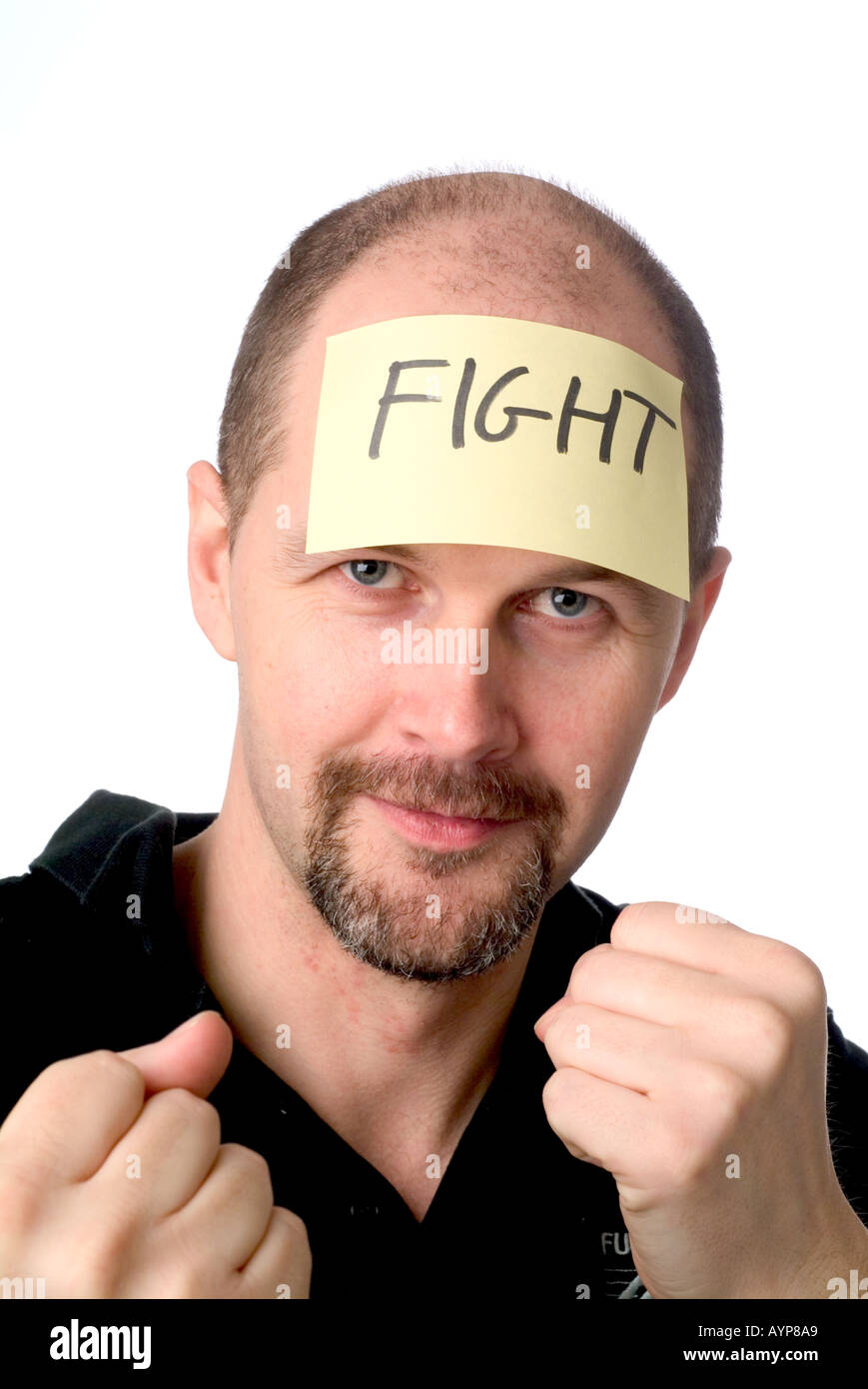 man with post it note on head depicting fight fighting anger agression ...