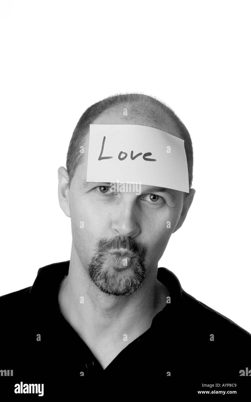 man with post it note on head depicting love happiness happy in love ...