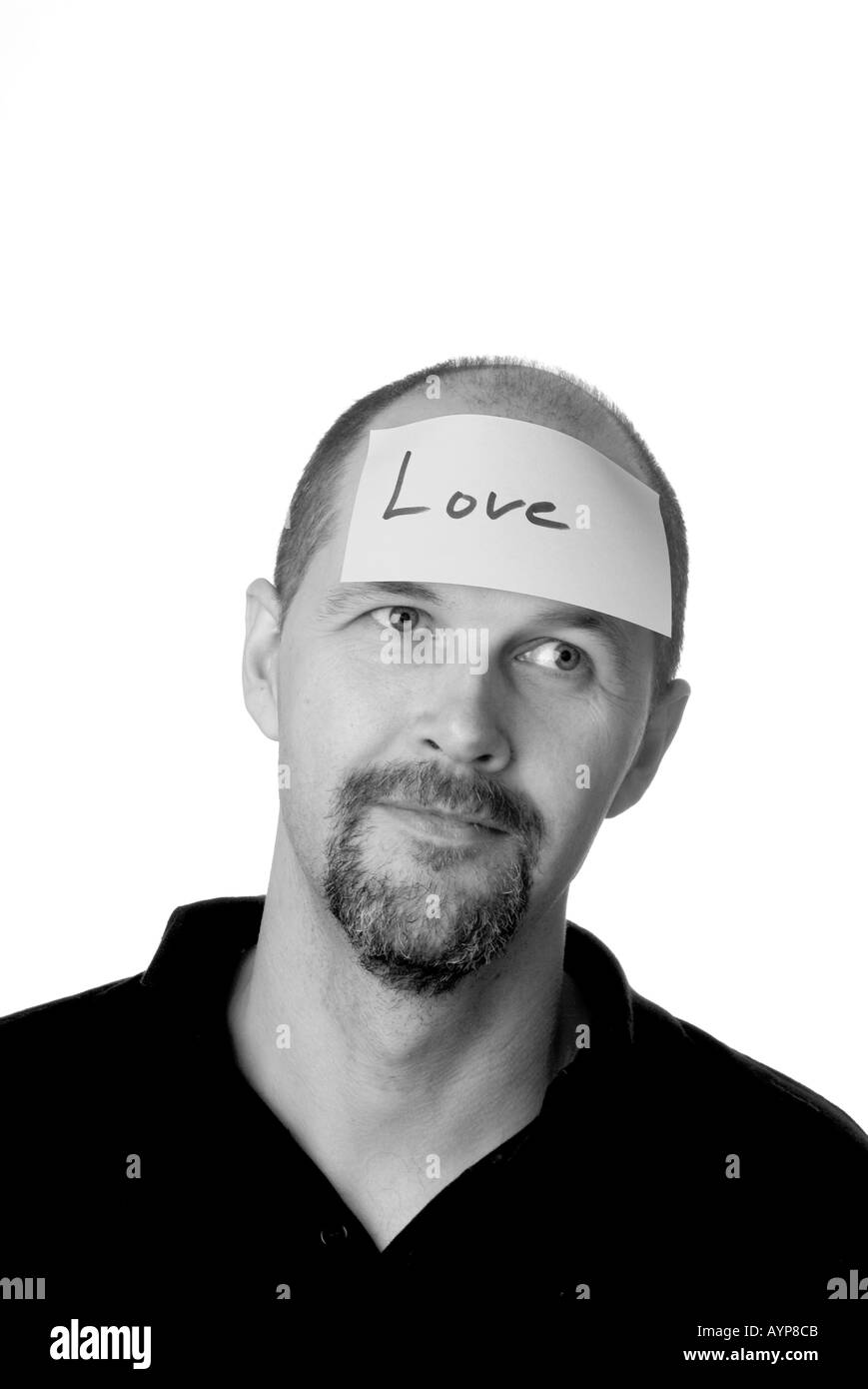 man with post it note on head depicting love happiness happy in love ...