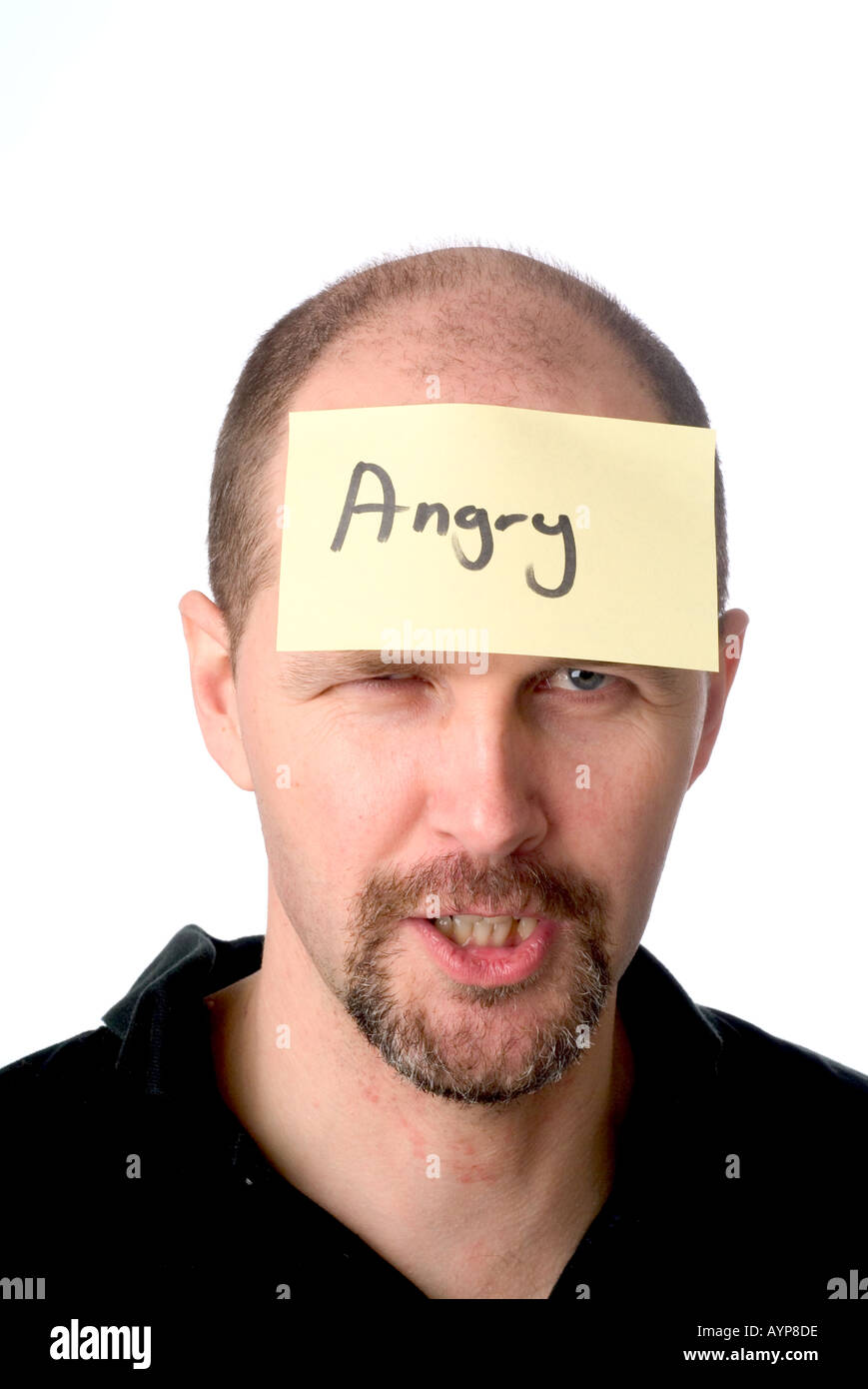 man with post it note on head depicting fight fighting anger agression ...
