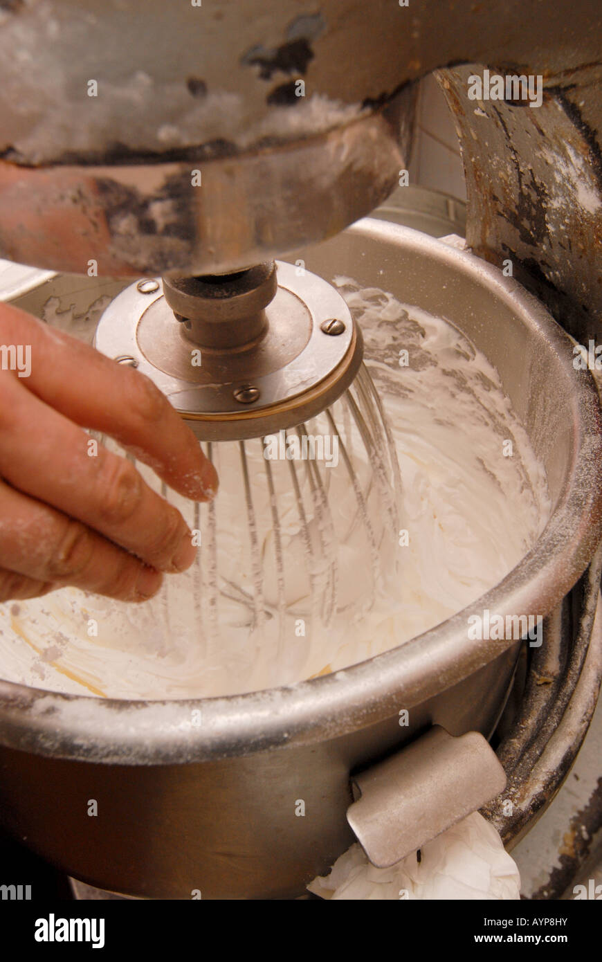 whisking with machine Stock Photo - Alamy