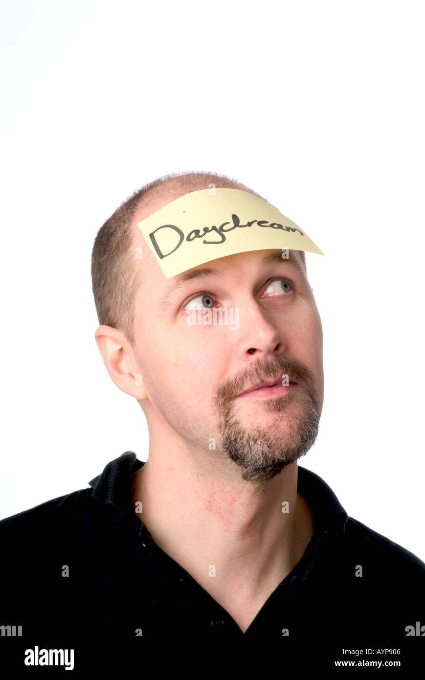 man with post it note on head daydreamimg day dreamer dream dift away ...