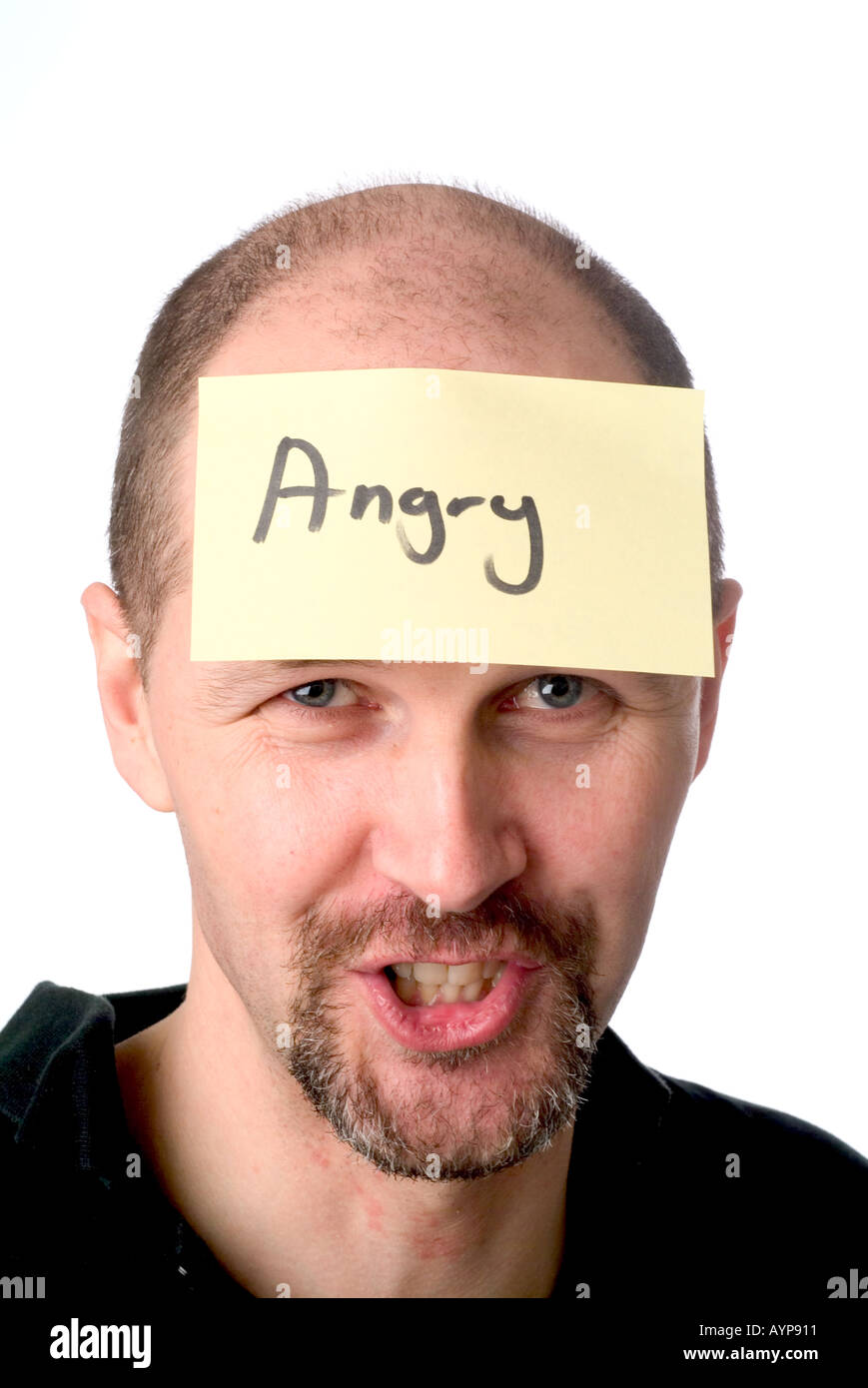 man with post it note on head depicting fight fighting anger agression ...