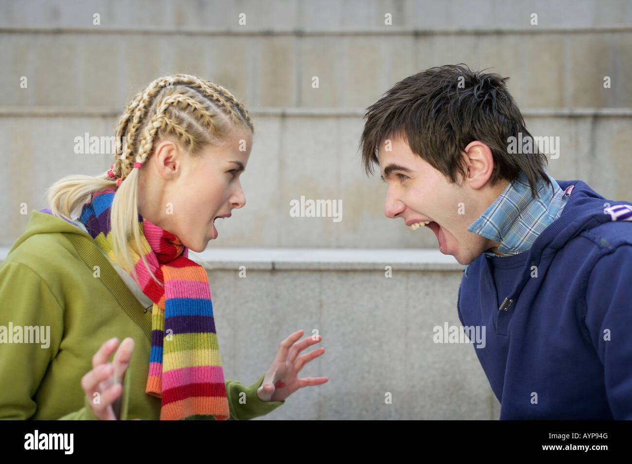 Two young people yelling other hi-res stock photography and images - Alamy