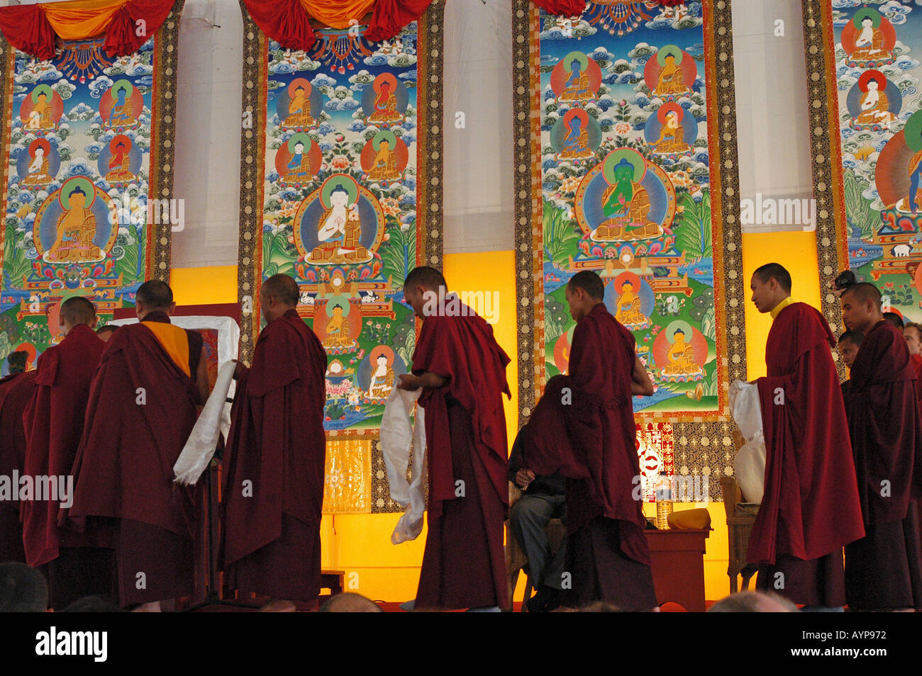 Group of tibetan monks waiting in line for blessing of HE Shamar ...